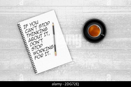 Inspirational quote on notepad Stock Photo - Alamy