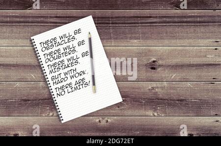Inspirational quote on notepad Stock Photo - Alamy