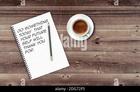Inspirational quote on notepad Stock Photo - Alamy