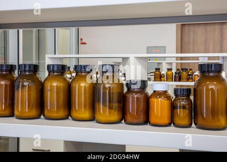 Close up amber color bottles in laboratory. Amber bottle for storing ...