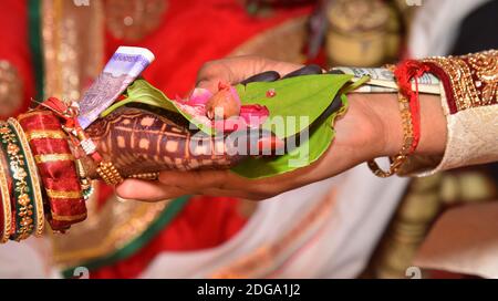 Indian Gujarati wedding Hastmelap ritual the brides father gives ...
