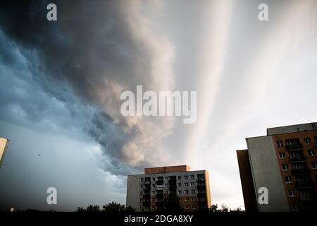 A local hurricane rages over city skyscrapers. The sky is covered with ...