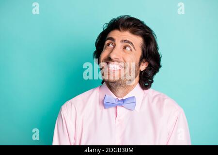 Portrait of attractive cheerful dreamy wavy-haired girl rejoicing ...