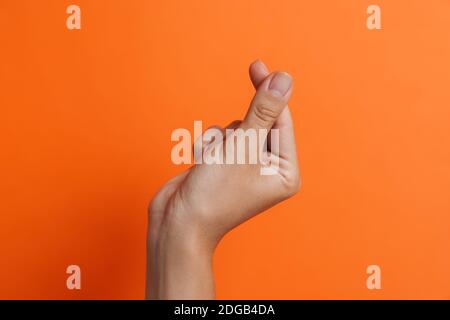 Woman's hand showing snapping gesture isolated Stock Photo - Alamy