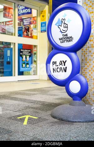 National Lottery Play Now free-standing advertising shop sign outdoors ...