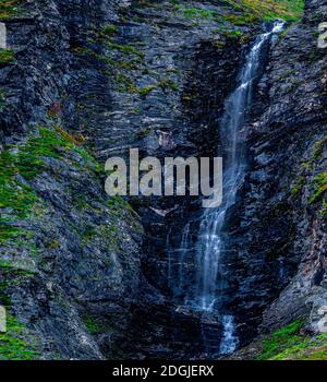 Waterfall free falling from a steep mountain slope Stock Photo - Alamy