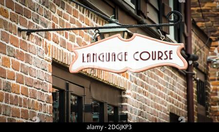 Street Sign to LANGUAGE COURSE Stock Photo - Alamy