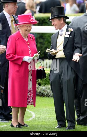Queen Elizabeth II and racing manager John Warren during day five of ...