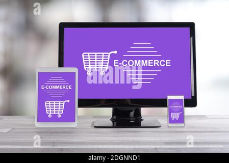 E-commerce concept shown on different information technology devices ...