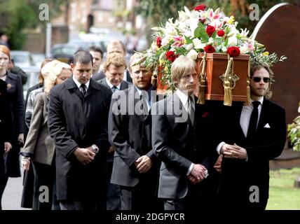 Crispian Mills (front ) carrying the coffin of his late grandfather ...