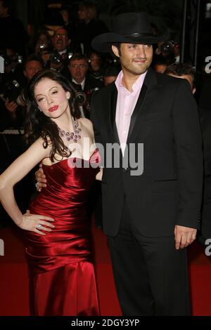 Robert Rodriguez and Rose McGowan arriving at the amFAR Cinema Against ...