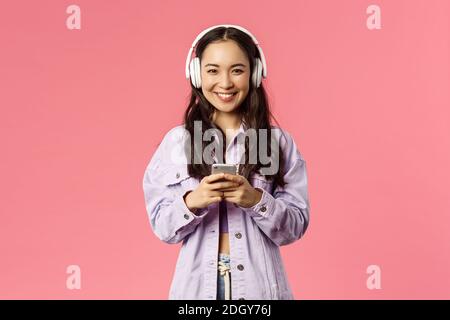 Modern korean girl in stylish spring outfit, sunglasses, showing shush ...