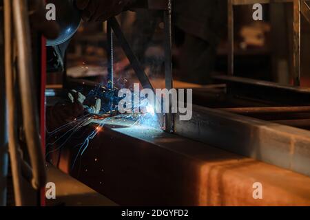 Welding of metal structures using semi-automatic weld Stock Photo - Alamy