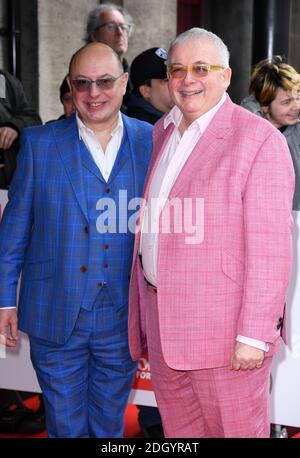 Christopher Biggins and partner arriving at the TRIC Awards, Grovesnor ...