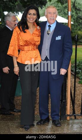 Bruce Forsyth, arrive at Sir David Frost's annual summer garden party ...