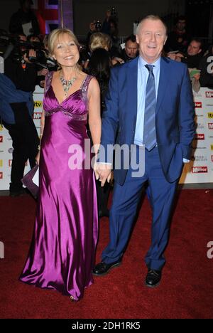 Chris Tarrant and partner Jane Bird arriving for the 2011 National ...
