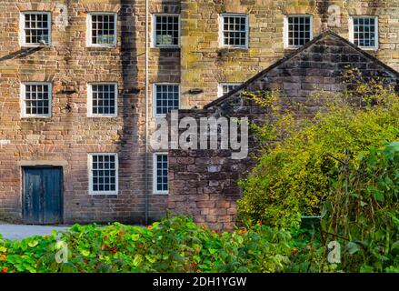 Factory buildings at Cromford Mill the world's first water powered ...