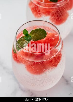 Glasses of tasty soda with ice on table Stock Photo - Alamy