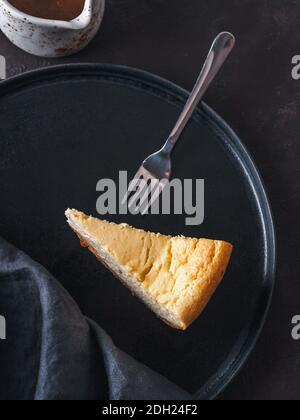 Classic New York cheesecake on light blue concrete background, top view ...