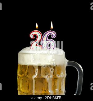 Candle number 26 - Birthday in orange background Stock Photo - Alamy