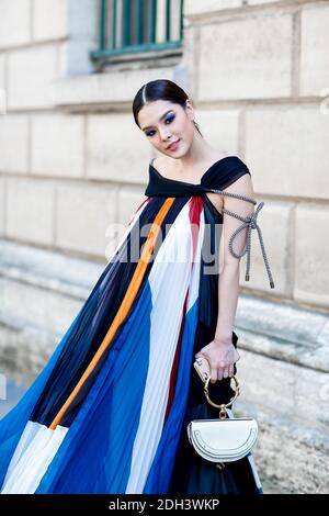 Street style, Lydia Sarunrat Deane arriving at Ulyana Sergeenko Fall ...