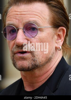 U2 lead singer and co-founder of the organisation ONE Bono stands ...