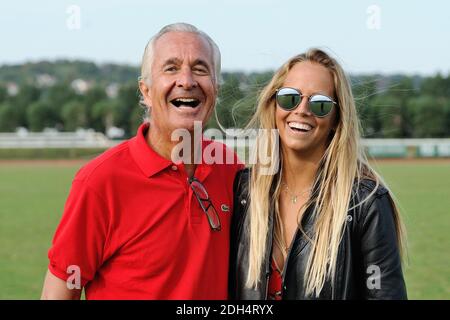 Thomas Rinderknecht et une invitee assistent a la Coupe Diane Barriere ...