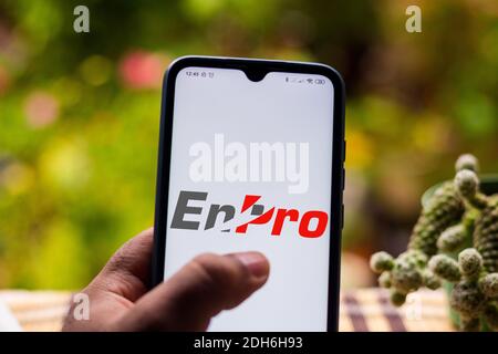 In this photo illustration, the Enpro logo is seen displayed on a ...