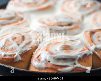 Vegan cinnabon rolls with topping Stock Photo - Alamy