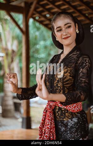 women presenting traditional Javanese dance movements Stock Photo - Alamy