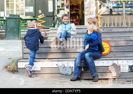 Preschool children building exterior with playground on a sunny day ...