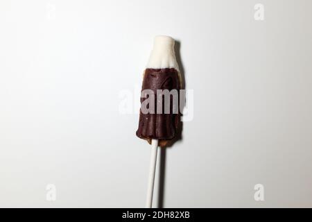 Coke bottle-shaped cola flavored lollipops Stock Photo - Alamy