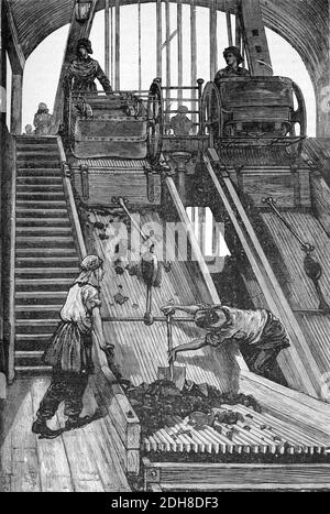 Sorting coal at a coal mine Stock Photo - Alamy