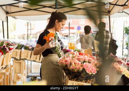 Owner working at flower shop Stock Photo - Alamy