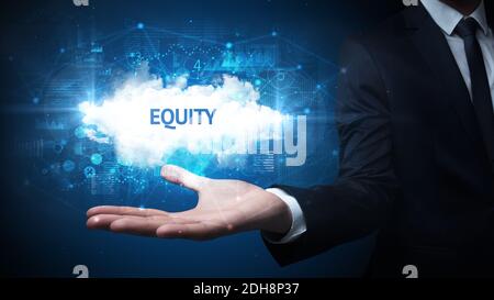 Hand of Businessman holding EQUITY inscription, successful business ...