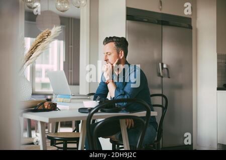 man having video chat on tablet pc at home Stock Photo - Alamy
