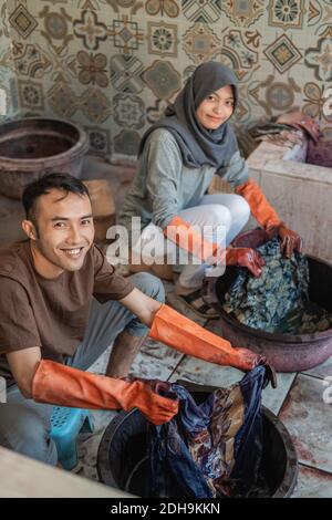 coloring process on Indonesian batik cloth Stock Photo - Alamy