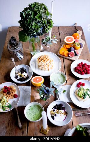 High angle view of various food arranged on white background with copy ...