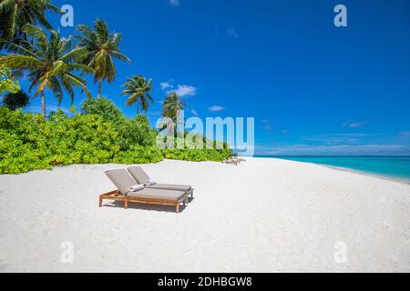 Two sun beds and a sun umbrella at the amazing beach of Agia Theodoti ...