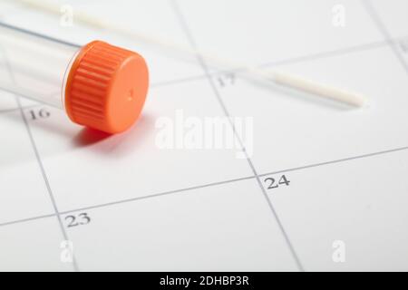 Rapid test kit, vial with orange cap and swab, sticker for patient data ...