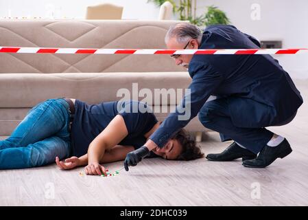 Old male forensic expert at the crime scene Stock Photo - Alamy