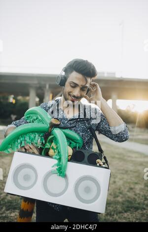 Young Festival goers in a space themed decorated trolley at Camp ...