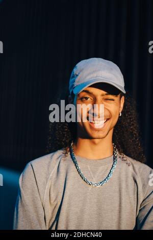 Portrait of young man at sunset Stock Photo - Alamy