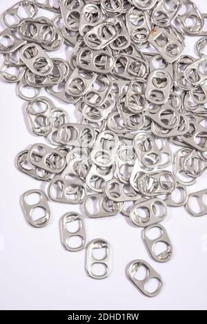 Close up rings pull aluminum of soda or beer metal can isolate on wood ...
