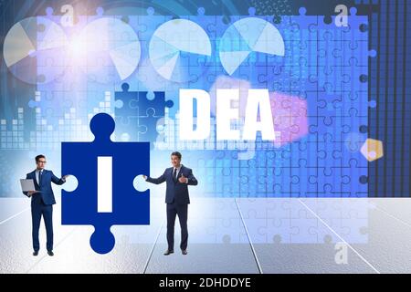Idea concept with the businessman putting jigsaw puzzle Stock Photo - Alamy