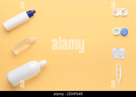 Containers with contact lenses, solutions, tweezers and eyeglasses on ...