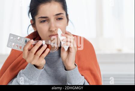 Health problems beautiful woman orange plaid in light background napkin ...