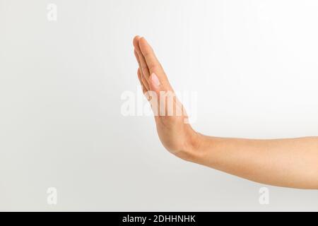 Hand signal expressing stop on white background Stock Photo - Alamy