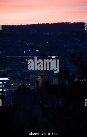Beautiful vertical shot of a city with evening lights Stock Photo - Alamy