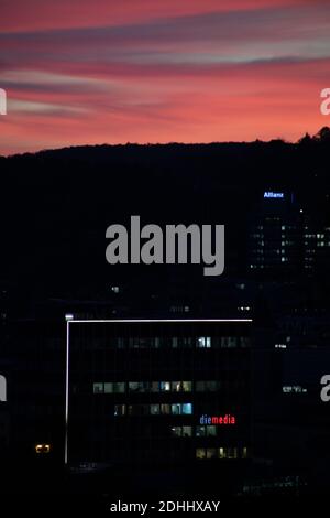 Beautiful vertical shot of a city with evening lights Stock Photo - Alamy